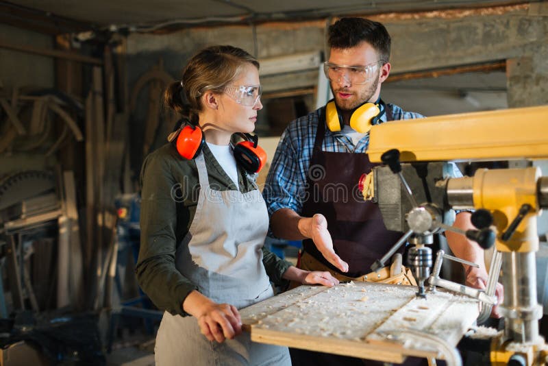 Interaction of woodworkers stock photo. Image of worker - 77251520