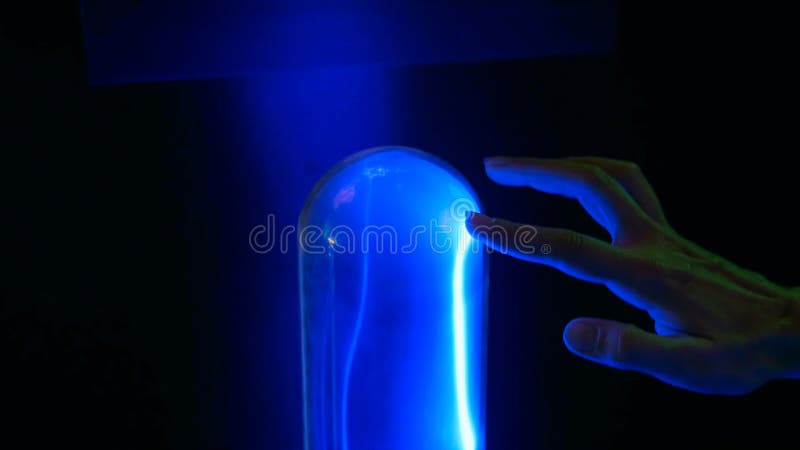 Woman Touching Plasma Glass Flask Stock Photo - Image of flask, tesla ...