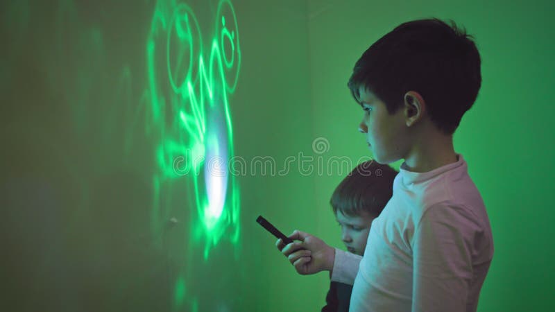 Interactive Games, Cute Male Children Draw with Lanterns Using Light on ...