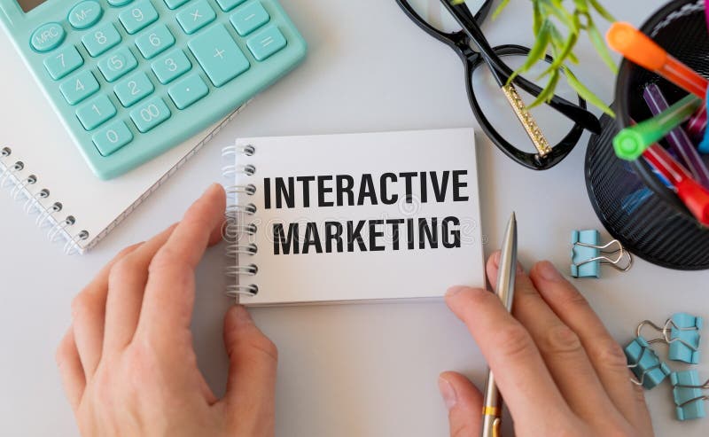 Interactive Marketing Text Written on a Paper with Pencils in Office ...