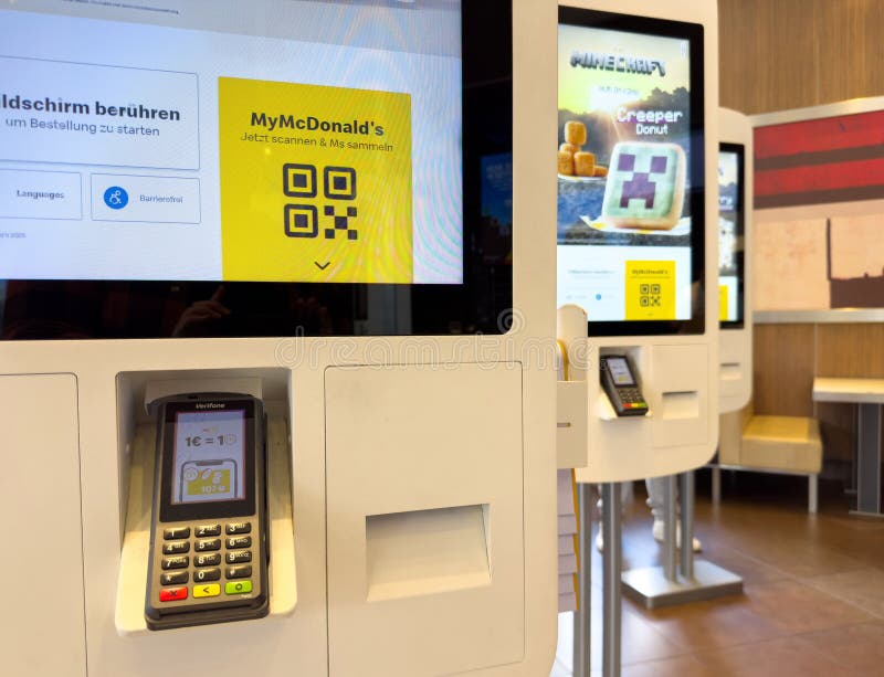 Interactive Self-service Kiosks in Modern Fast Food Restaurant Interior ...