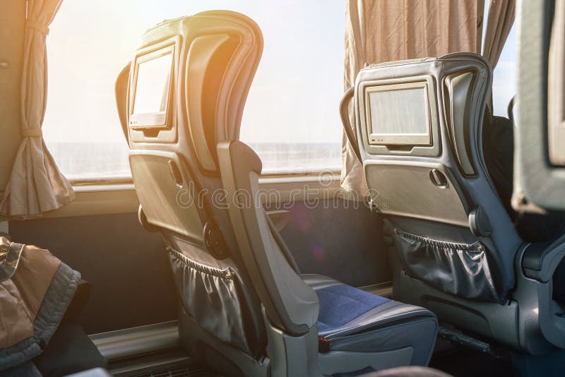 Intercity Bus Interior with Seat-mounted Interactive Touchscreen Stock ...