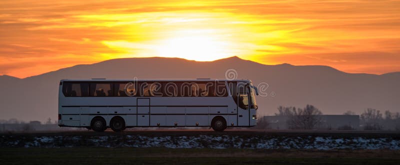 Intercity Passenger Bus Driving on Highway Road in Evening Stock Photo ...