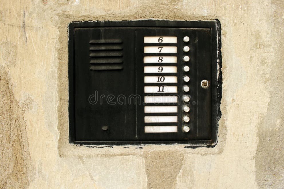 Intercom Device with Numbers on Old Breaking Plaster Wall Stock Photo ...