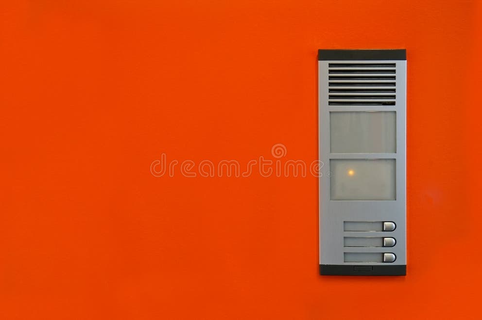 Intercom on the Orange Wall Stock Image - Image of global, inside: 4244985