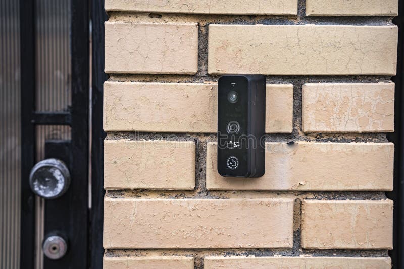 Intercom Panel with a Video Camera on the Brick Fence of Private House ...
