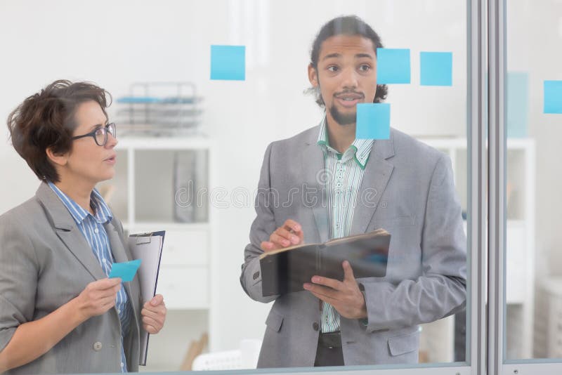 Discussing working points stock image. Image of executive - 107659775