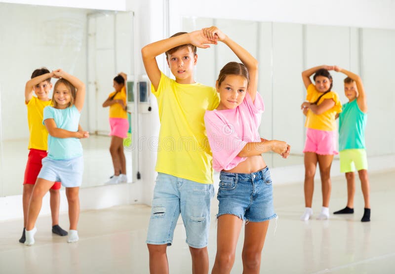Tween Boy and Girl Practicing Slow Pair Dancing during Group Class ...