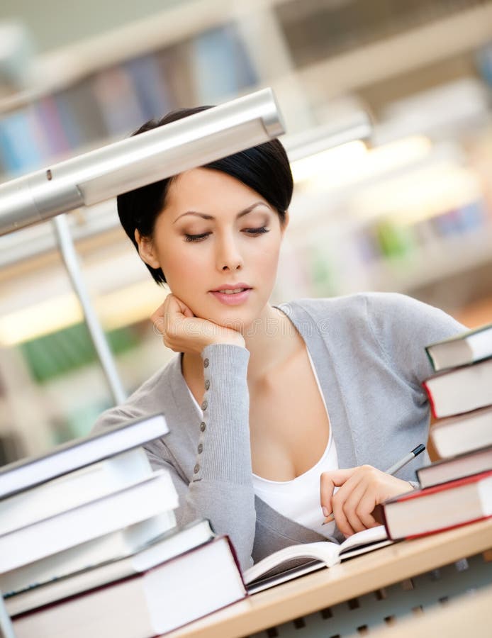 Interested Woman Reads at the Library Stock Image - Image of caucasian ...