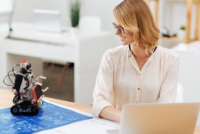 Interested Woman Working with Robot in the Office Stock Photo - Image ...