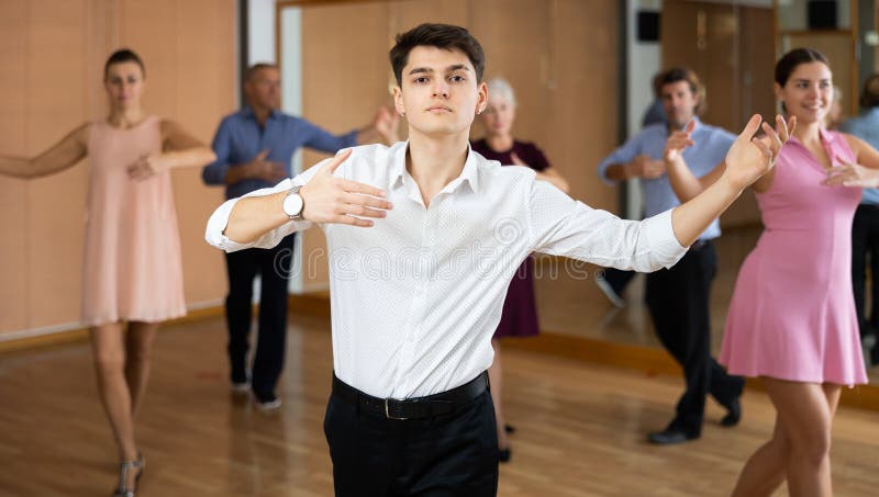 Guy Practicing Movements of Slow Dance during Group Class Stock Photo ...