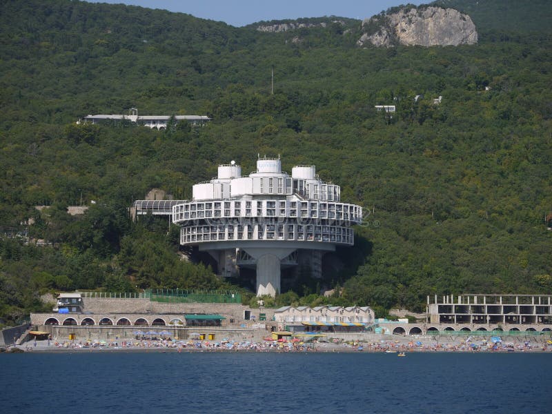 An Interesting Architectural Building Connected To the Mountain ...