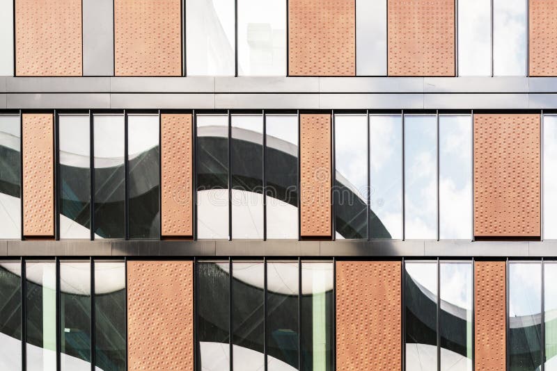 Interesting Architectural Twist on a Modern Building with Glass Windows ...