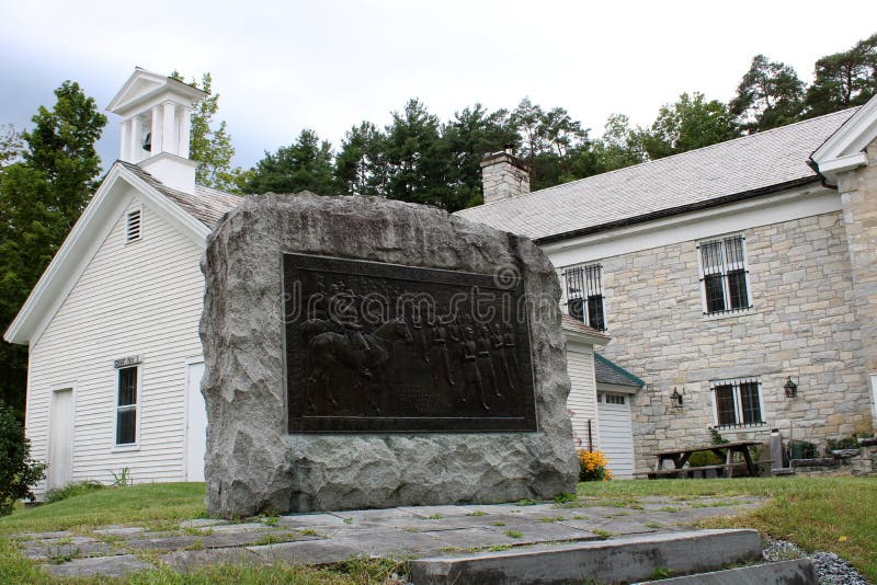 Exterior Architecture with Stone and Bronze Tablet in Front, Describing ...