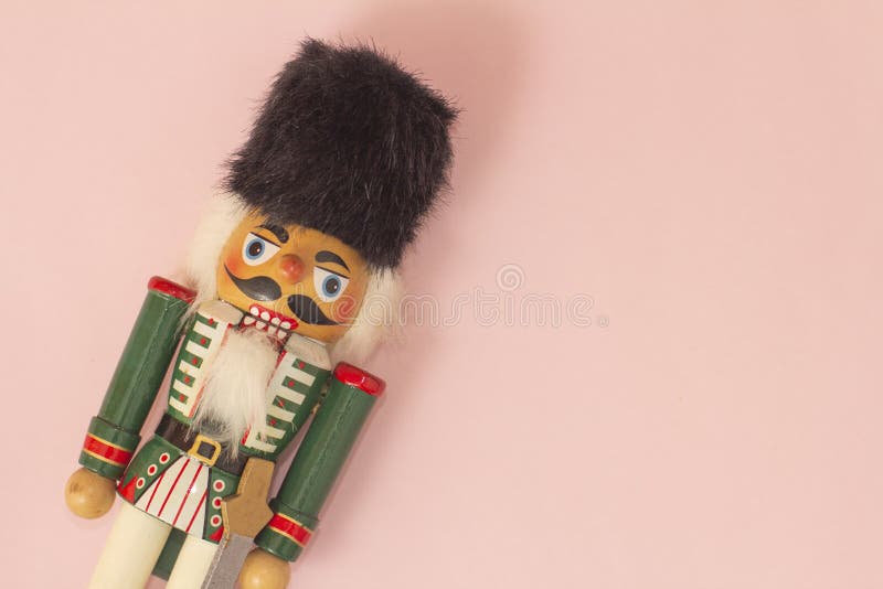 Interesting Beautiful Christmas Nutcracker Soldier on Pink Colored ...