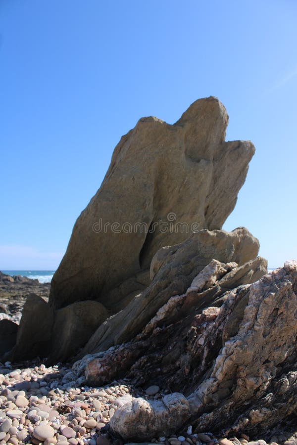 Interesting Rock Formation at the Beach. Stock Image - Image of pebbels ...