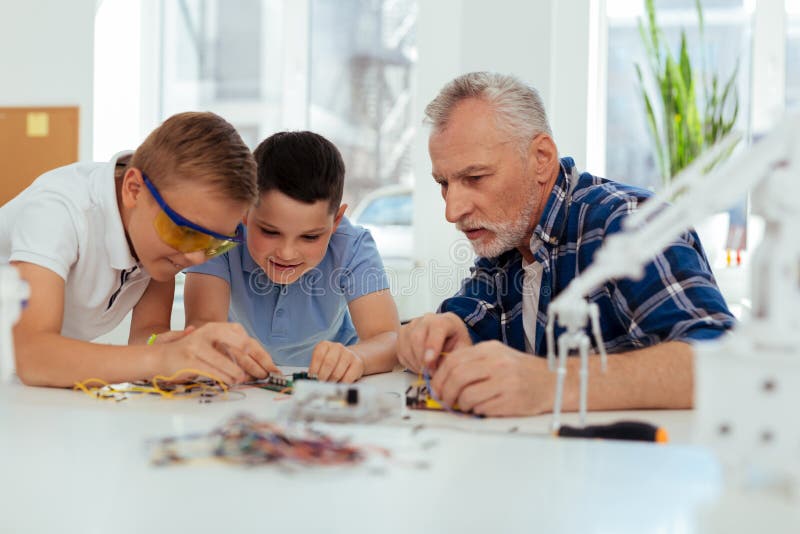 Nice Smart Boys Working Together Stock Photo - Image of maturity ...