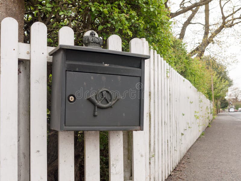 An Interesting and Unique Black Post Box Outside Locked with an Stock ...