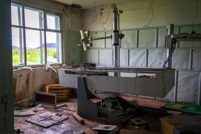 Interior of an Abandoned Destroyed Hospital. X-ray Machine Stock Photo ...