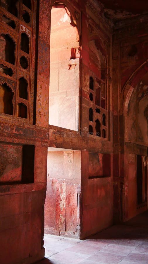Interior of Agra Fort: Shadowed Red Walls and Unique Overhead Passage ...