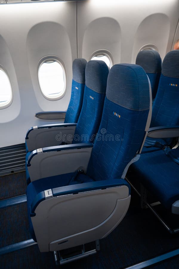The Interior of the Aircraft. Empty Airplane Cabin Editorial Stock ...