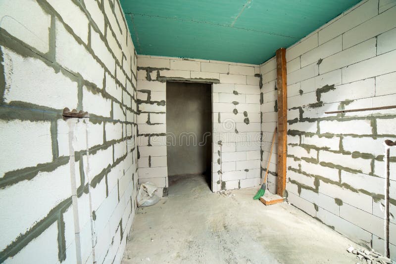 Interior of an Apartment Room with Bare Walls and Ceiling Under ...