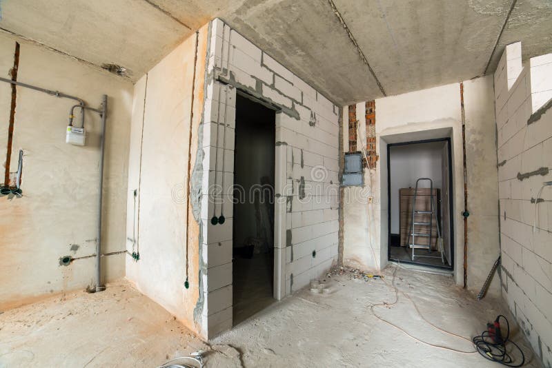 Interior of an Apartment Room with Bare Walls and Ceiling Under ...