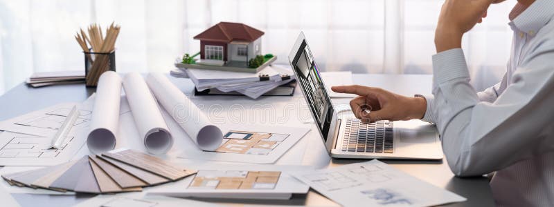 Interior Architect Designer at Table with Architecture Software ...