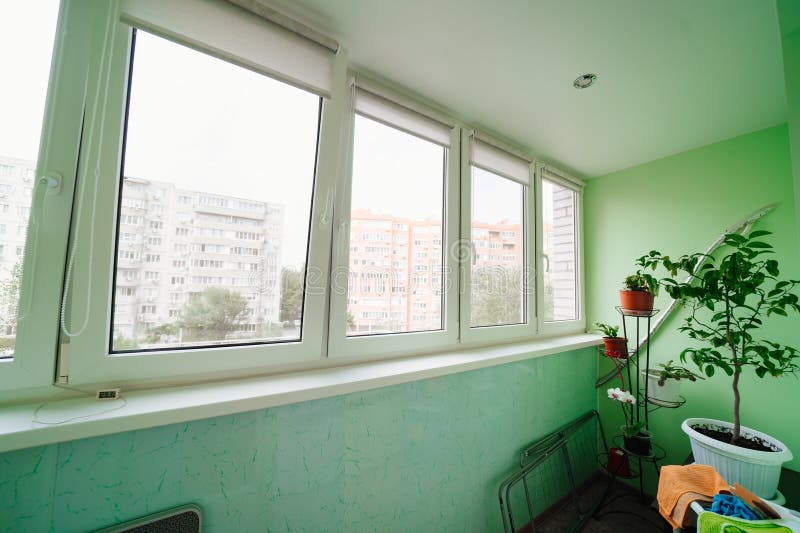 Interior of the Balcony with Large Glazed Windows in the Apartment ...
