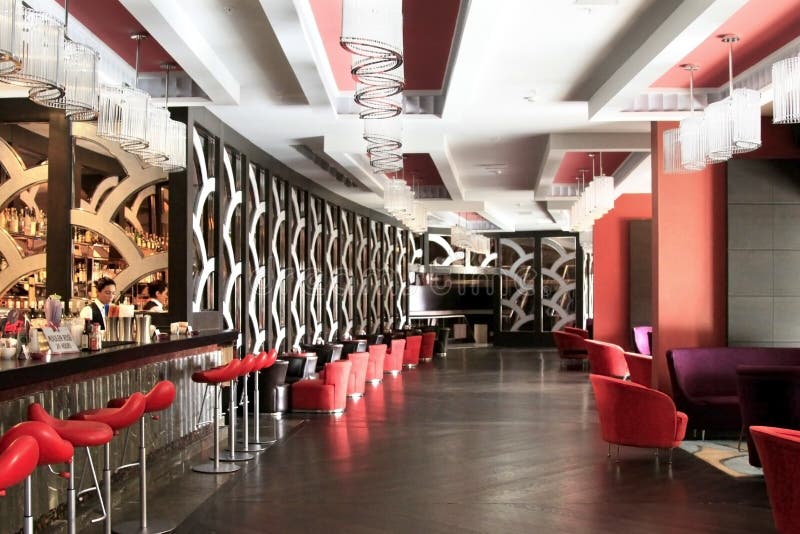 Interior of Bar in High-tech Style with High Red Bar Stools and Chairs ...