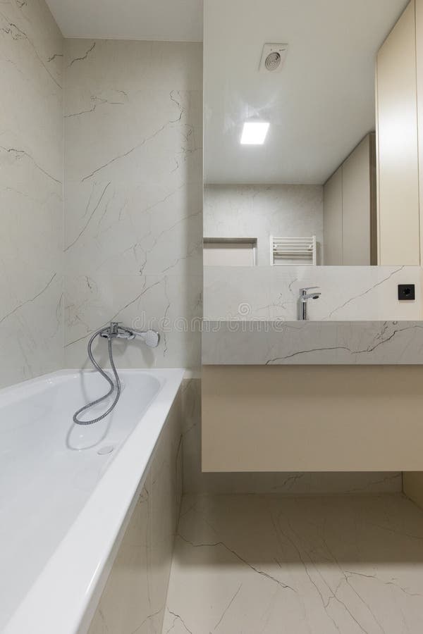 Interior of a Bathroom in a New Building Stock Photo - Image of sink ...