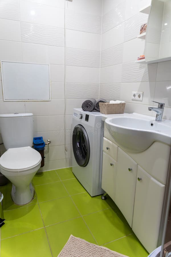 Interior of Bathroom with White Sink, Toilet and Washing Machine Stock ...
