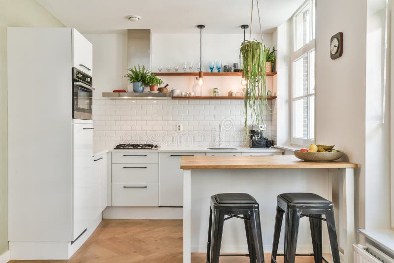 Beautiful kitchen design stock image. Image of apartment - 222908279