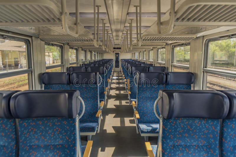 Interior of Blue Train with Blue Seat and Wooden Armrest Stock Image ...