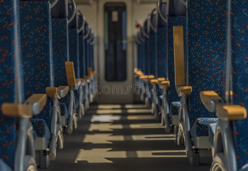 Interior of Blue Train with Blue Seat and Wooden Armrest Stock Image ...