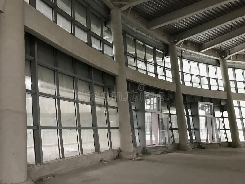 Interior of a Building Under Construction Shows Large Windows and ...