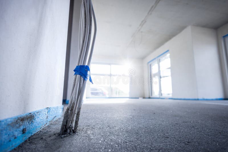 Interior of a Building Under Construction with Wiring Emerging from the ...