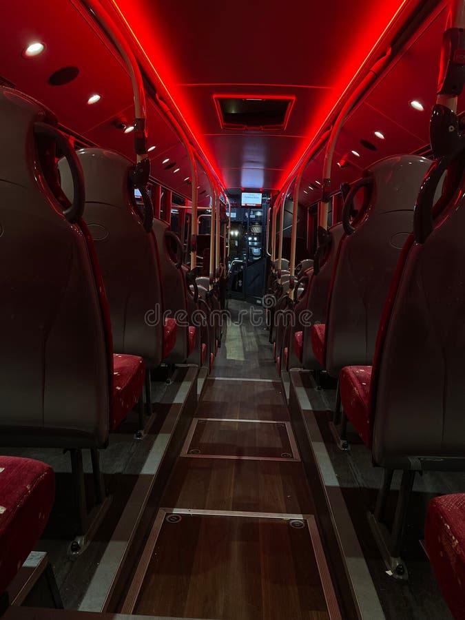 Interior of a Bus Illuminated with Red Light. Stock Photo - Image of ...