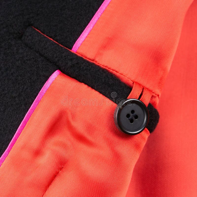 Interior Button Pocket in Black Wool Coat with Bright Red Lining. Close ...