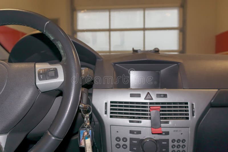 .the Interior of the Car, Where the Main Focus is on the Steering Wheel ...