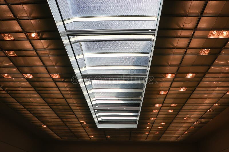 Interior Ceiling with a Geometric Pattern, Featuring Rows of Recessed ...