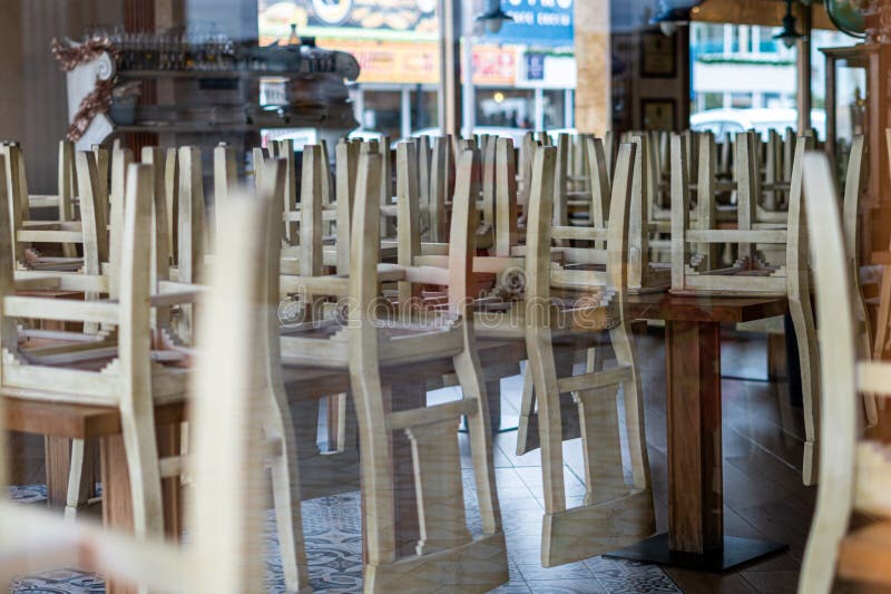 Interior with Chairs Arranged Upside-down on the Tables Stock Photo ...