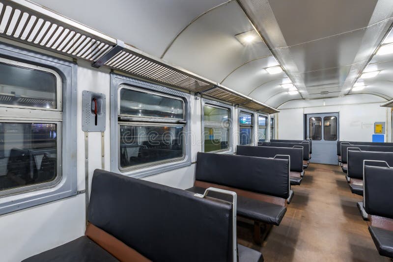 Interior of an Cheap Empty Train Car with Simple Bench-style Seating ...