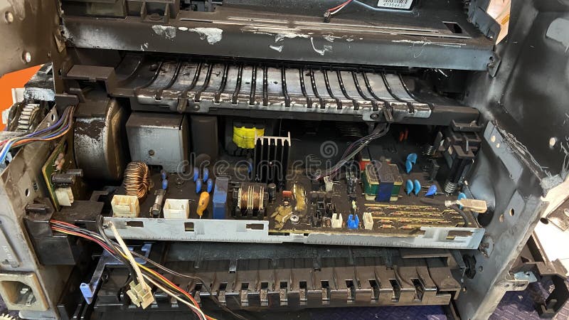An Interior Close-up of the Broken and Damaged Printer Removed by a ...