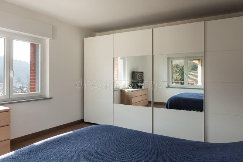 Interior, Closet with Mirror of a Bedroom Stock Photo - Image of wall ...