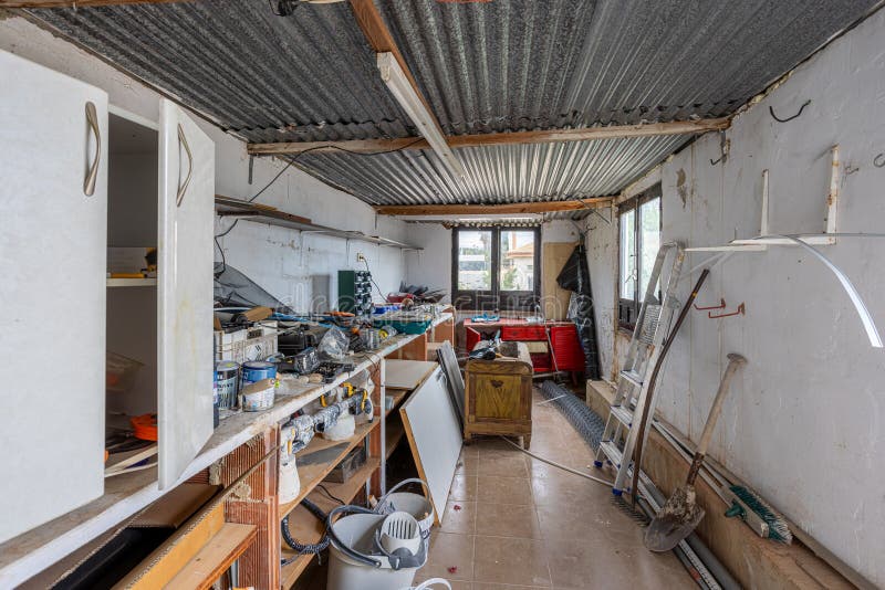 Messy Workshop with Tools and Equipment Editorial Stock Image - Image ...