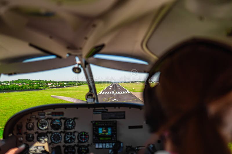 Interior Cockpit View of Small Aircraft Landing on Runway Stock Image ...