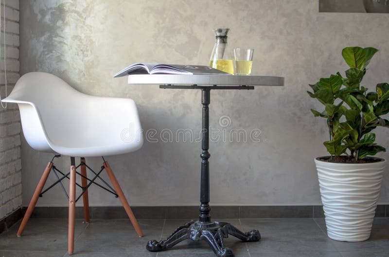Interior in the Coffee House. White Table and Chair in the Corner of ...
