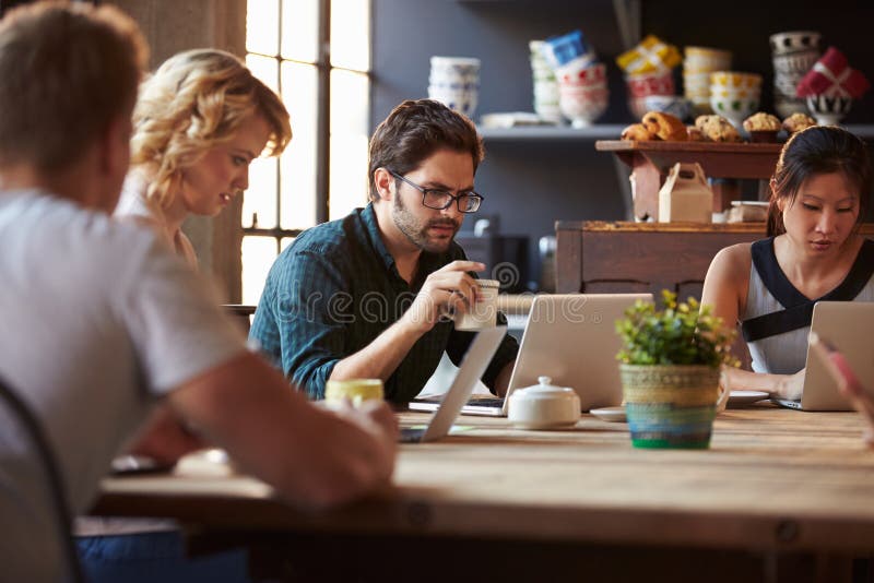 Interior of Coffee Shop with Customers Using Digital Devices Stock ...