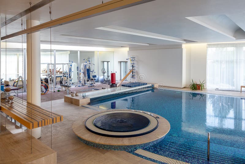 Interior of Comfortable Mansion with Training Room, Indoor Pool and ...